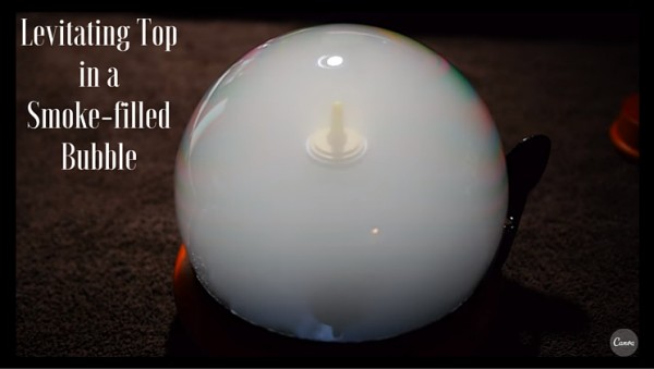 Levitating top trapped inside a smoke-filled bubble [video] - Alltop Viral